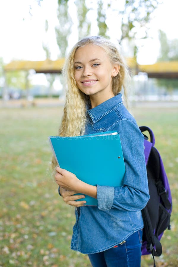 Beautiful Young Female Student in a Park Stock Photo - Image of girl ...