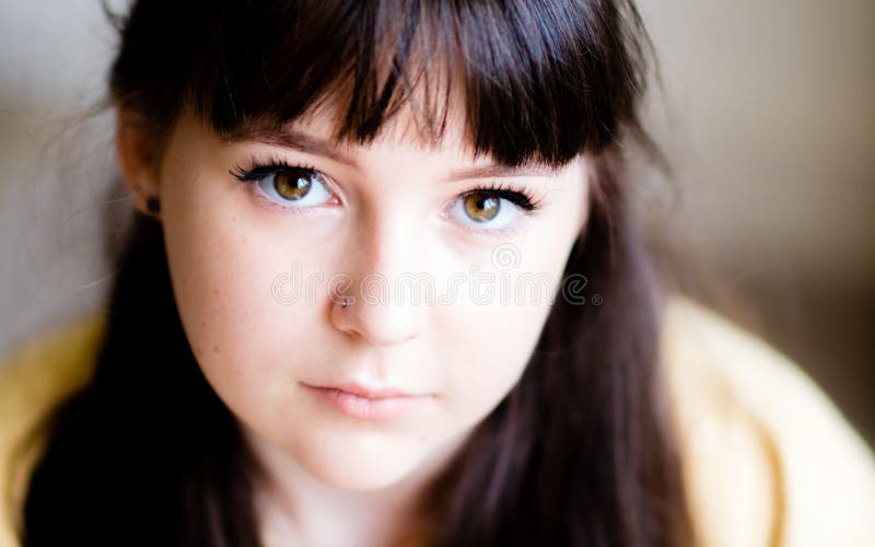 A Beautiful Young Girl Looking into the Camera Stock Image - Image of ...