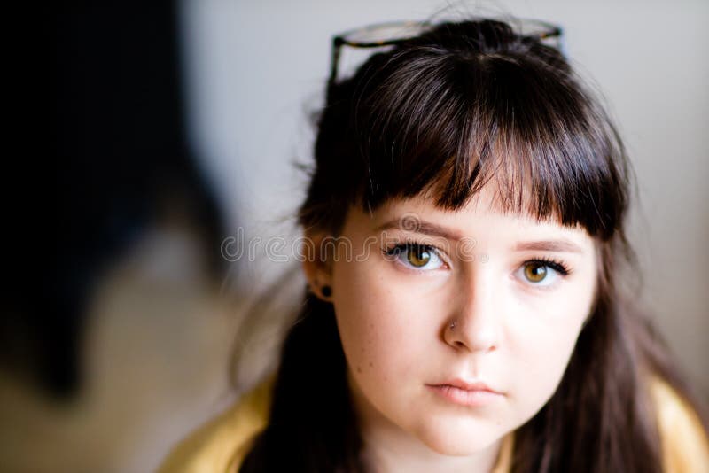 A Beautiful Young Girl Looking into the Camera Stock Image - Image of ...