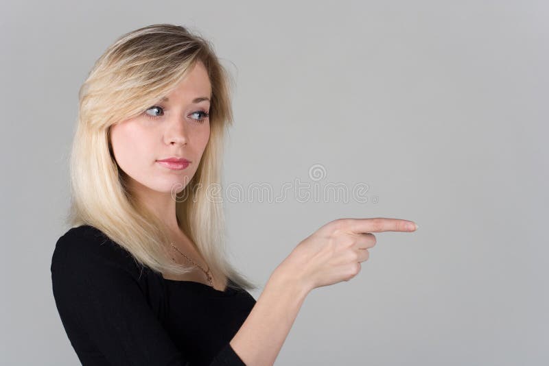 Beautiful Young Girl Points Ahead Stock Photos - Free & Royalty-Free ...