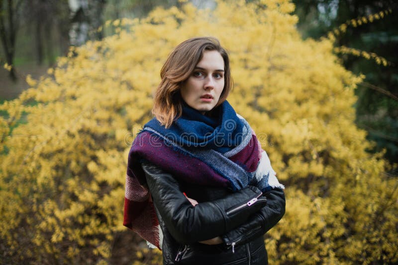 Beautiful Young Girl is Resting and Enjoying Spring in the Spring Park ...