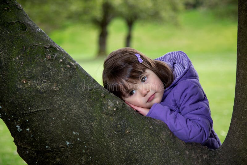 Beautiful Young Girl Resting on a Tree Stock Photo - Image of caucasian ...