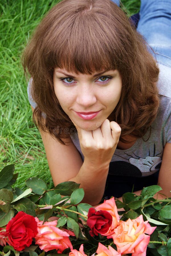 Beautiful Young Girl with Roses Stock Image - Image of eyes, lawn: 16066067