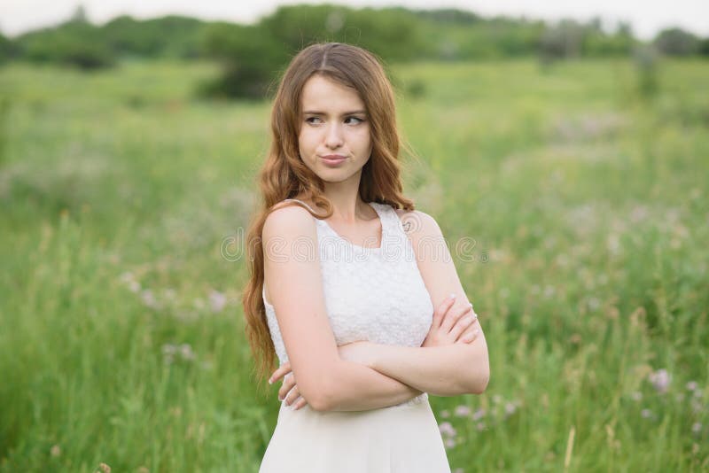 Beautiful Young Girl Shows Discontent in Nature. Stock Image - Image of ... Beautiful Young Girl Shows Discontent in Nature. Stock Image - Image of ...