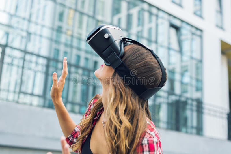 Beautiful Young Girl with Virtual Reality VR Headset on the Street ...