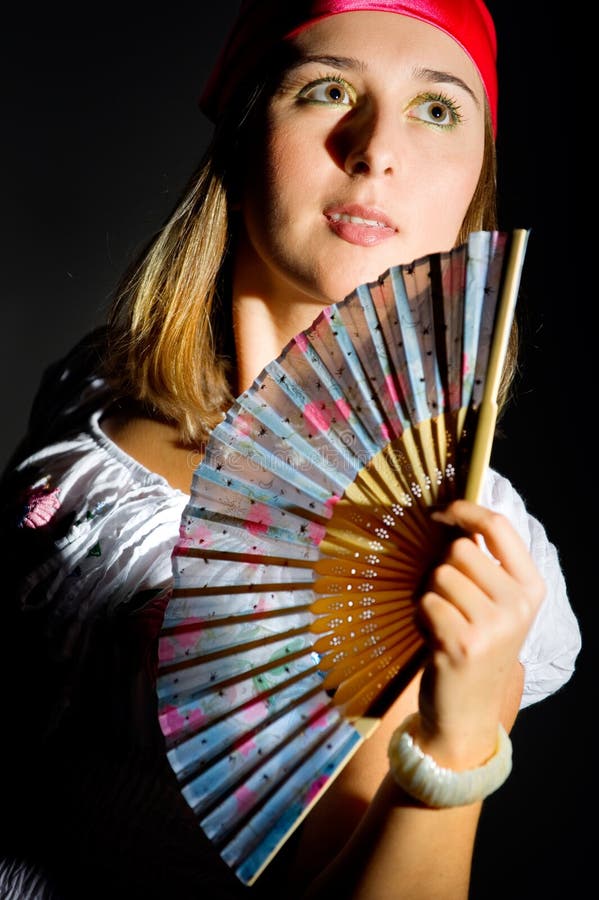 Beautiful Young Girl Waving a Fan Stock Image - Image of happy, charm ...