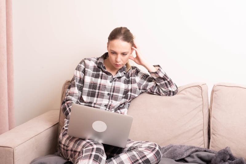 Beautiful Young Girl Works As a Freelancer, Focused on Work. Stock ...