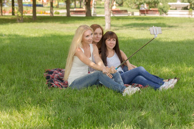 Beautiful Young Girls in the Park Make Selfi Stock Image - Image of ...