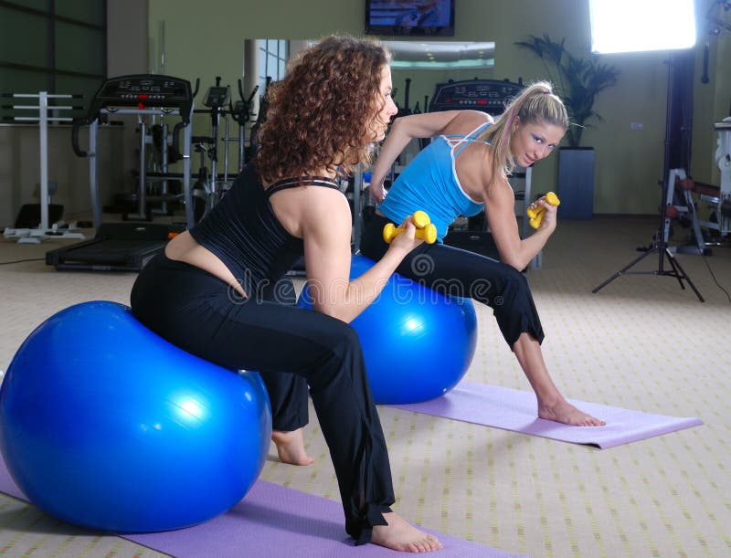 Beautiful Young Girls Working Out in a Gym Stock Image - Image of ...