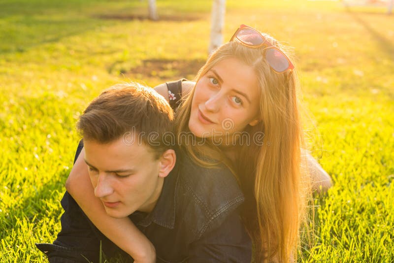 Beautiful Young Happy Couple Having Fun in the Grass. Stock Image ...