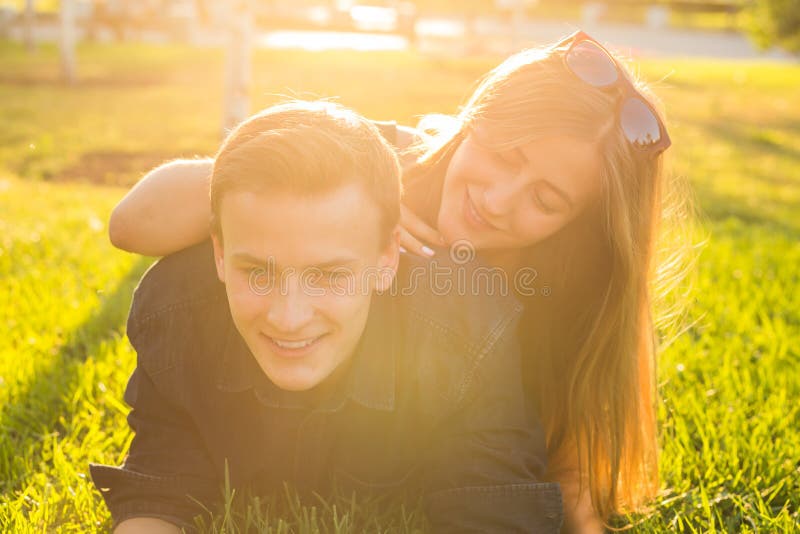 Beautiful Young Happy Couple Having Fun in the Grass. Stock Photo ...