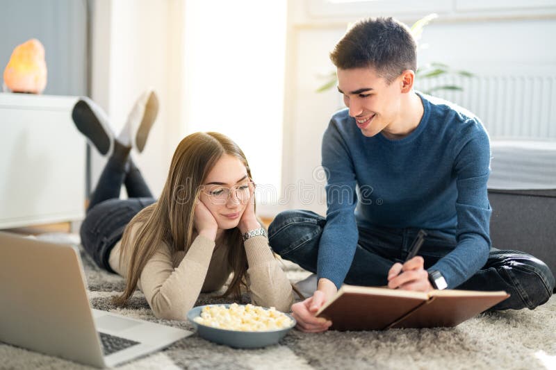 Beautiful Young High School Students Studying Together on the Floor at ...