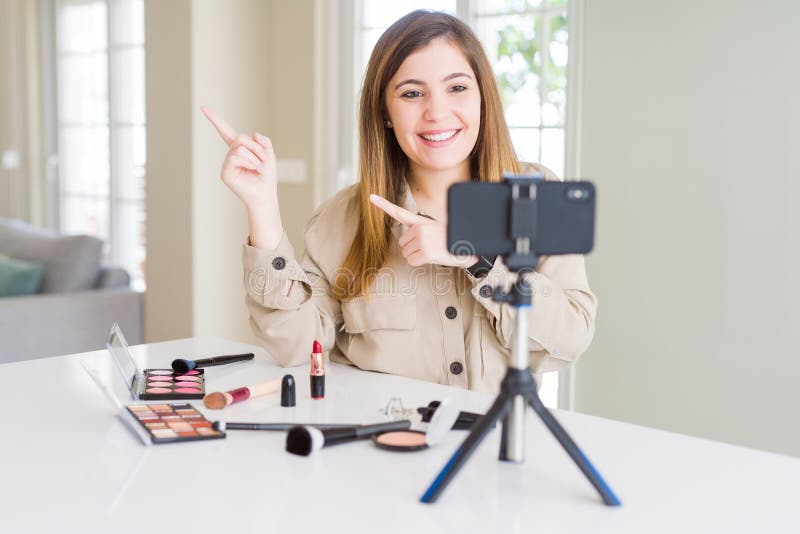 Young Influencer Woman Creating Social Media Videos with Smartphone ...