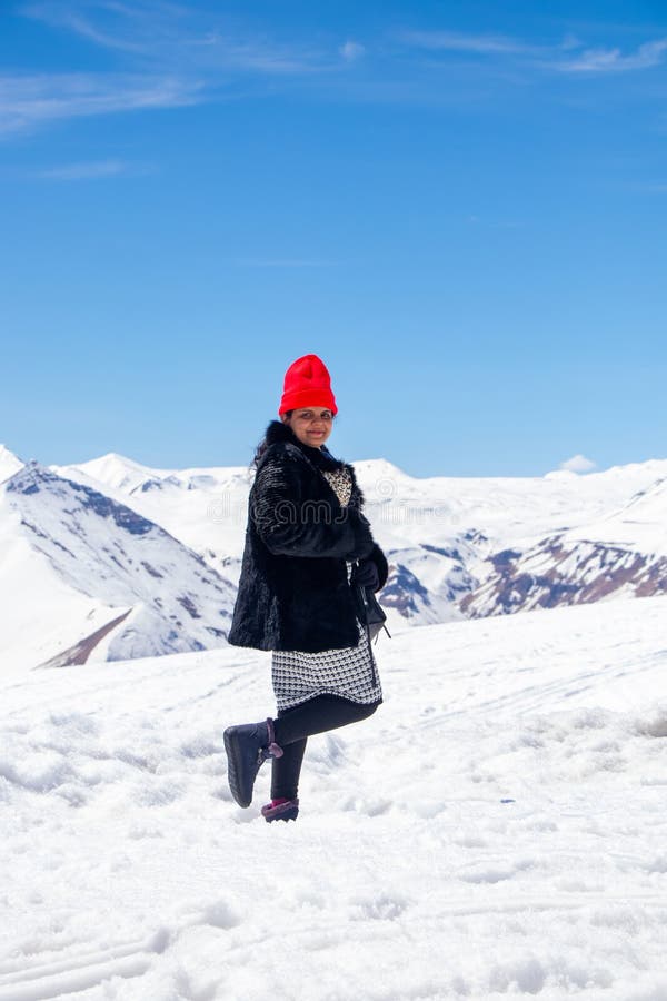 Beautiful Young Lady Having Fun Activity in Winter at Snow Mountain ...