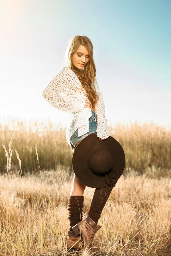 Beautiful Young Lady Model Posing in a Field at Golden Hour with a Hat ...