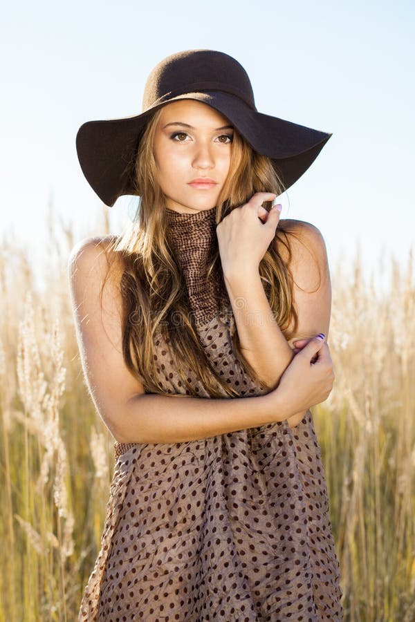 Beautiful Young Lady Model Posing in Front of Camera in a Field at ...