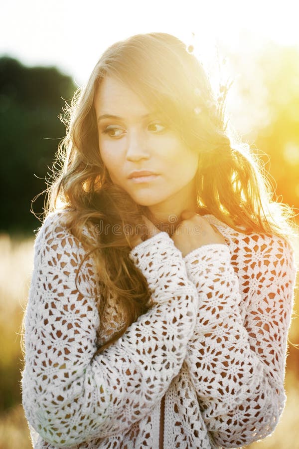 Beautiful Young Lady Posing in a Field at Golden Hour Stock Photo ...