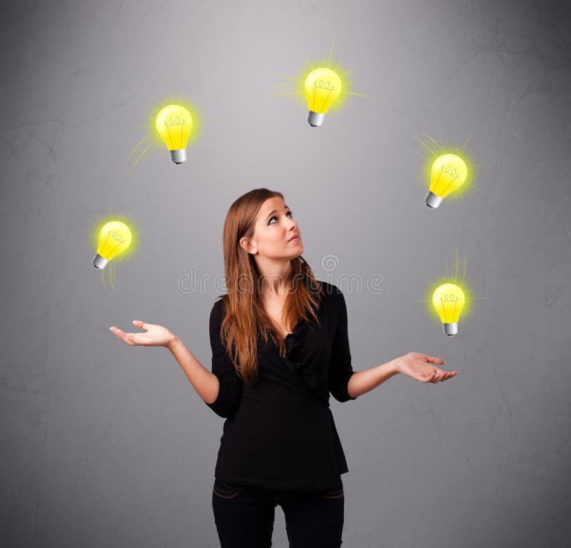 Young Lady Standing and Juggling with Light Bulbs Stock Photo - Image ...