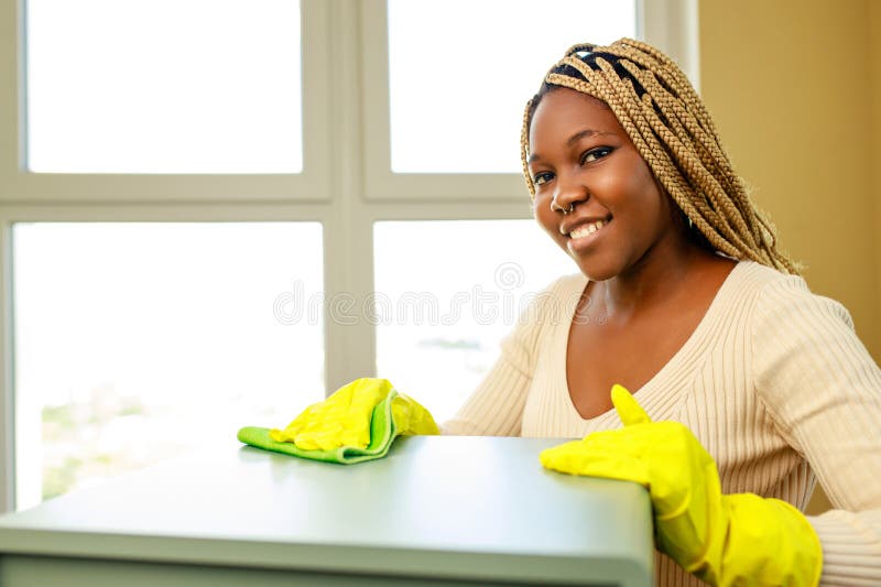 Beautiful Young Latin American Woman In Protective Gloves Cleaning At