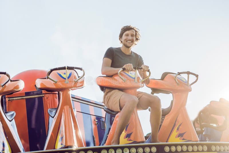 Beautiful, Young Man Having Fun at an Amusement Park Stock Image ...