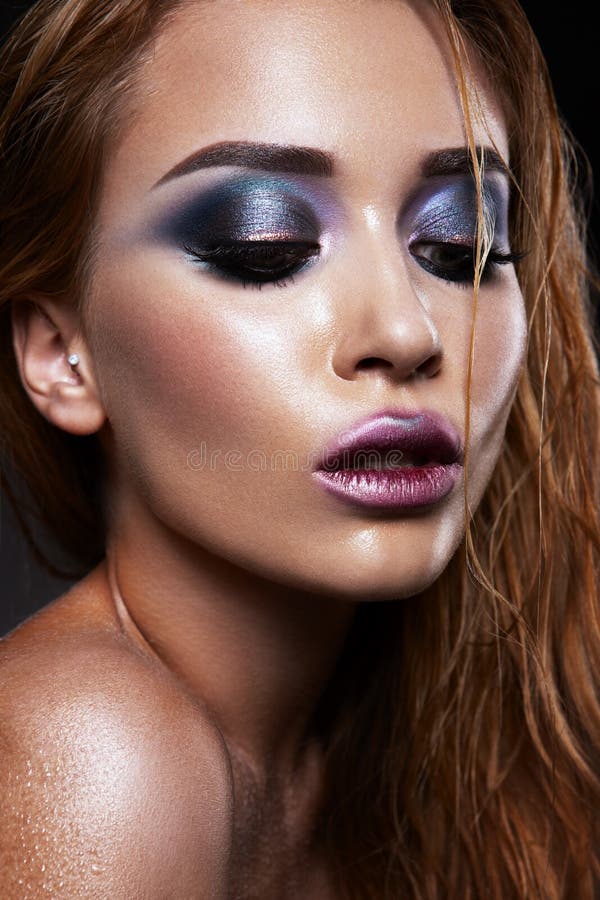Beautiful Young Model With Bright Make Up Blue Eyeshadow Stock Image
