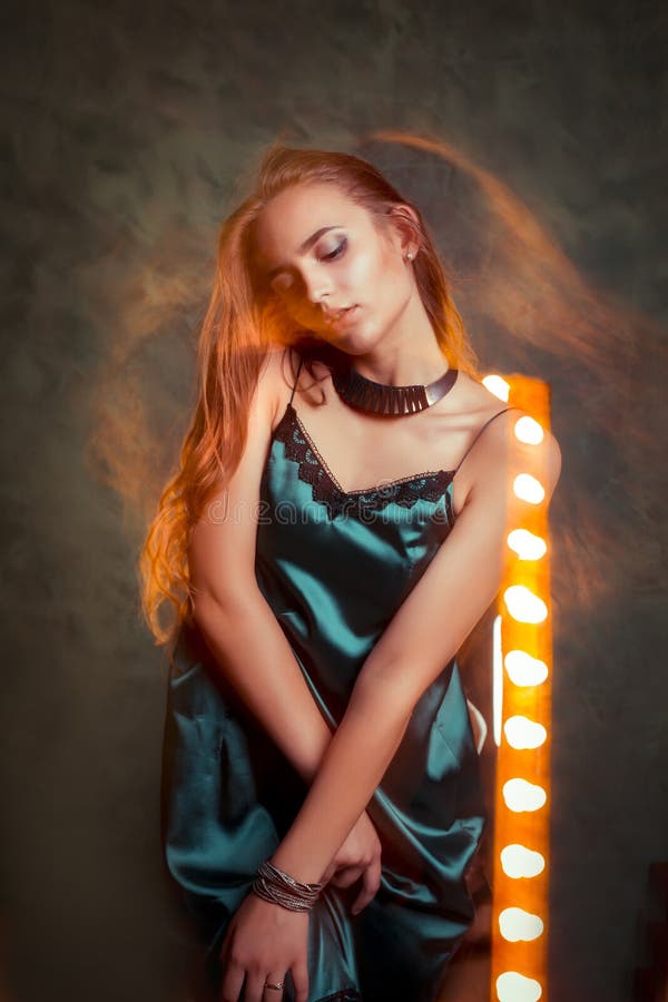 Beautiful Young Model Dancing in Mixed Light at Dark Studio Stock Photo ...