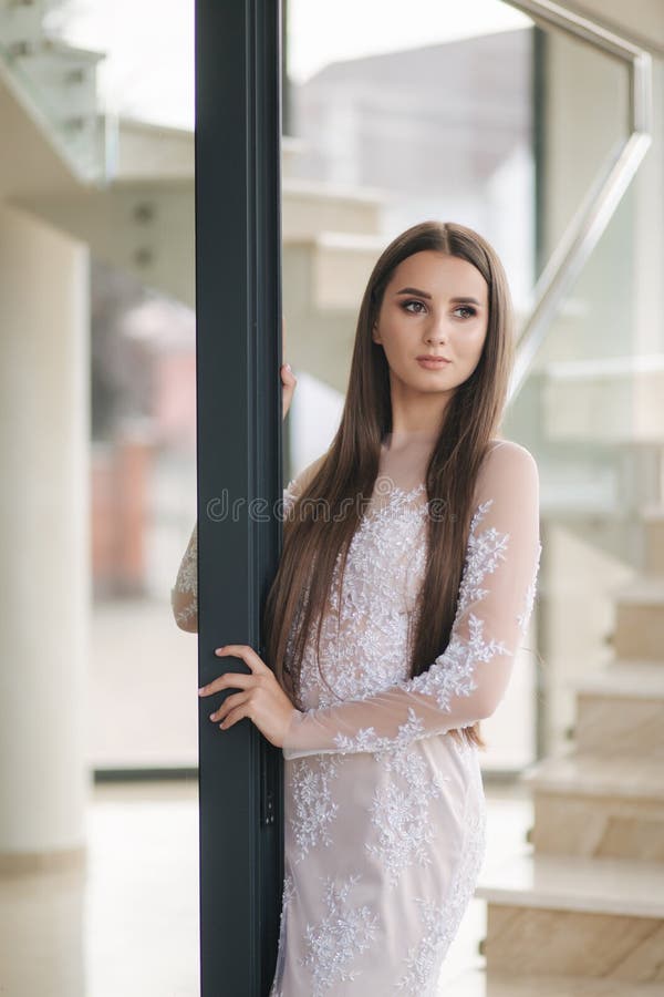 Beautiful Young Model in Evening Drees Posing To Photographer Stock ...