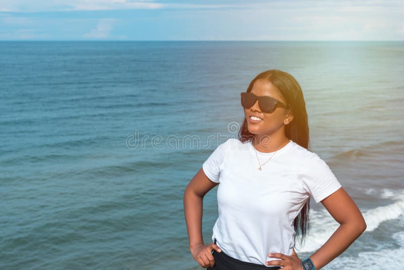 Beautiful Young Model by the Sea in Summer Posing with Sunglasses Stock ...