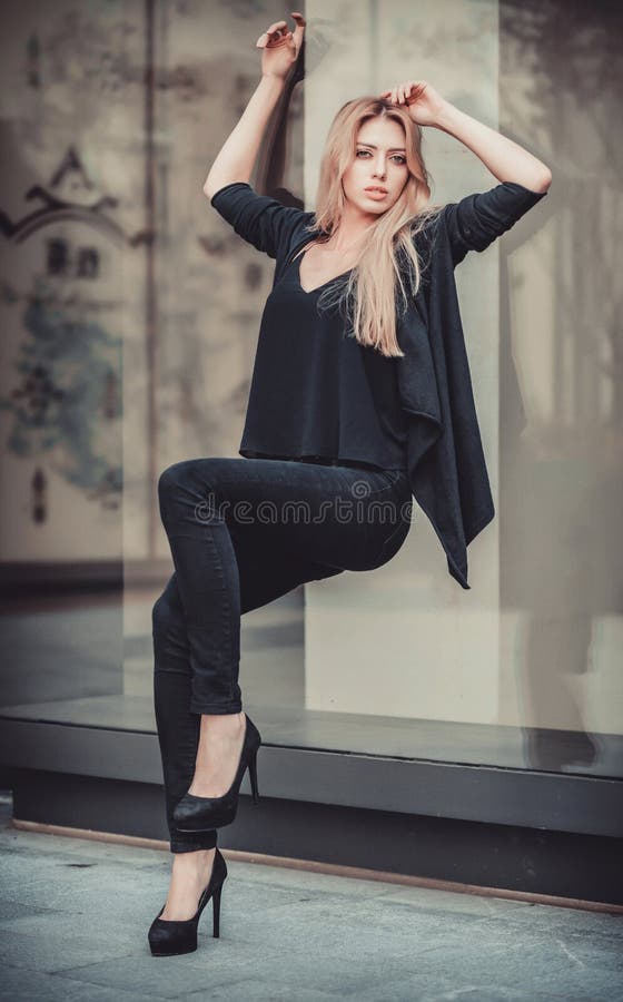 Beautiful Young Model Woman Posing in Modern Glass Environment. Stock ...