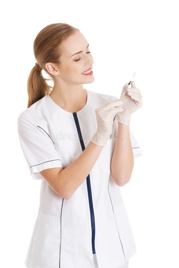 Beautiful Young Nurse with Needle. Stock Image - Image of insulin ...