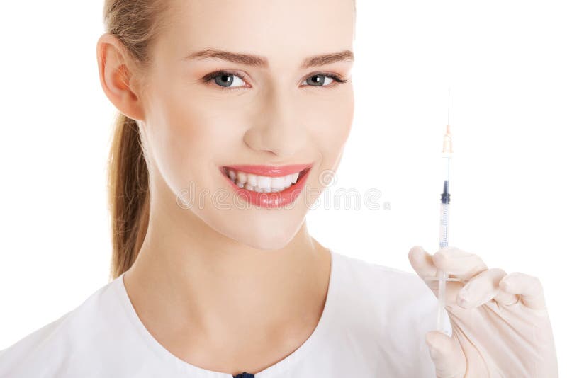 Beautiful Young Nurse with Needle. Stock Photo - Image of dose ...