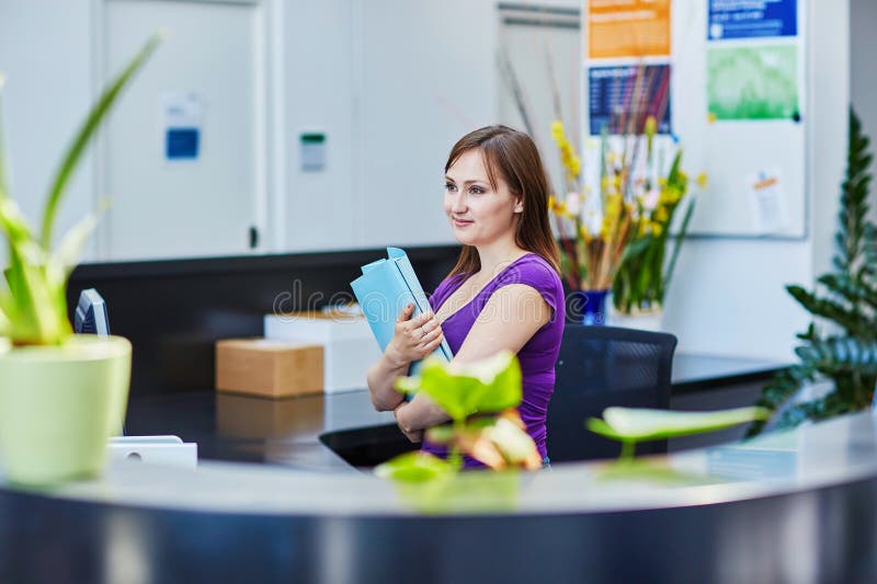 Beautiful Young Receptionist at Work Stock Photo - Image of agent ...