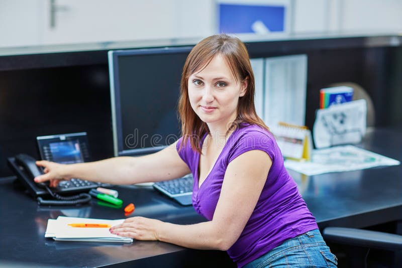 Beautiful Young Receptionist at Work Stock Photo - Image of call ...