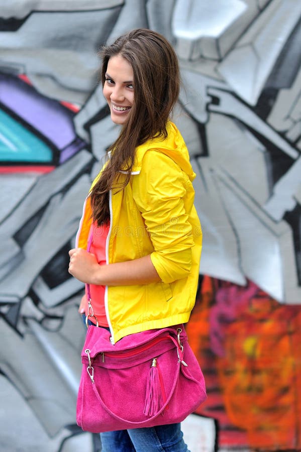 Beautiful Young Smiling Girl in Bright Clothes Stock Photo - Image of ...