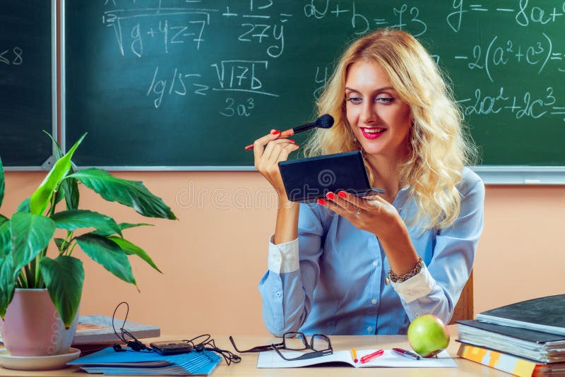Beautiful Young Teacher Making-up Stock Photo - Image of break ... Beautiful Young Teacher Making-up Stock Photo - Image of break ...