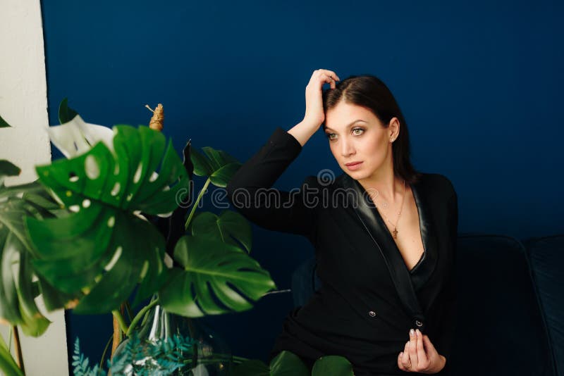 Beautiful Young Woman in Black Jacket at Home Stock Image - Image of ...