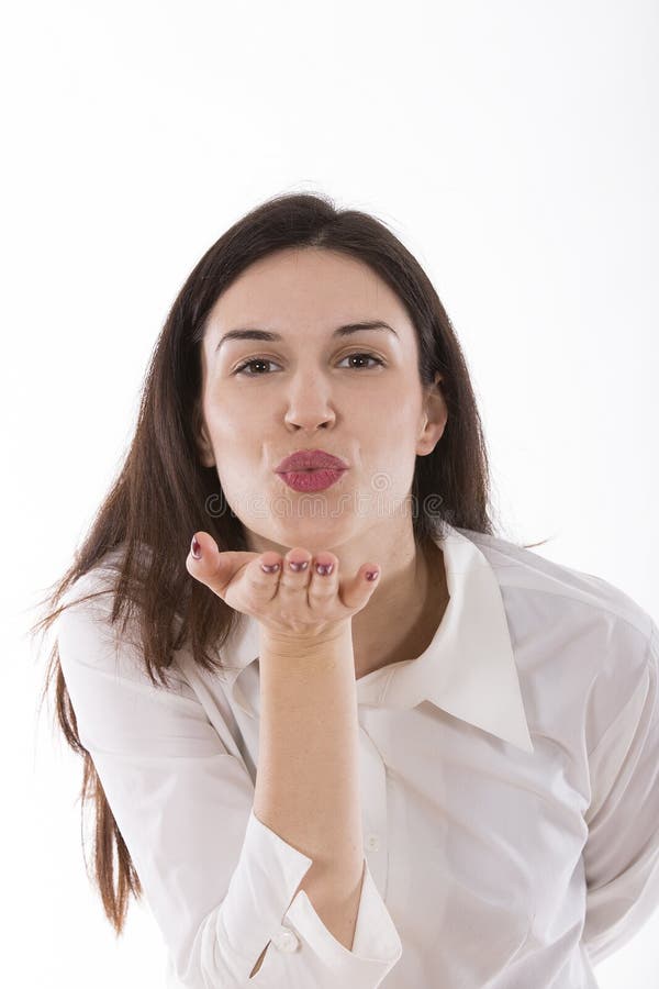 Beautiful Young Woman Blowing Forward Stock Photo - Image of sending ...
