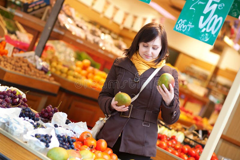 Beautiful Young Woman Buying Mangoes Stock Image - Image of european ...