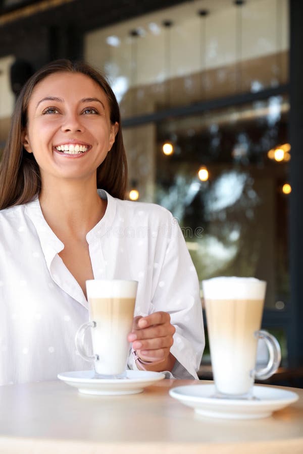 Beautiful Young Woman with Coffee at Table in Cafe Stock Image - Image ...