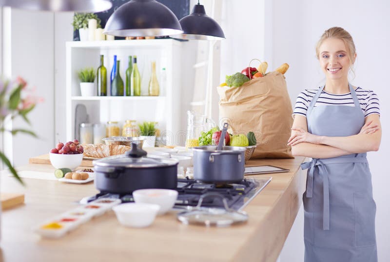 Beautiful Young Woman Cooking in Kitchen at Home Stock Photo - Image of ...