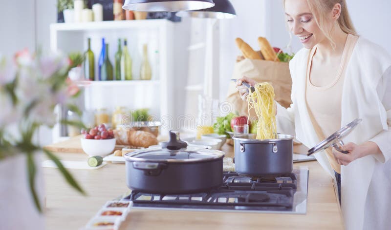 Beautiful Young Woman Cooking in Kitchen at Home Stock Image - Image of ...
