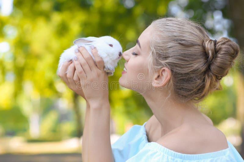 Beautiful Young Woman with Cute Rabbit Outdoors Stock Photo - Image of ...
