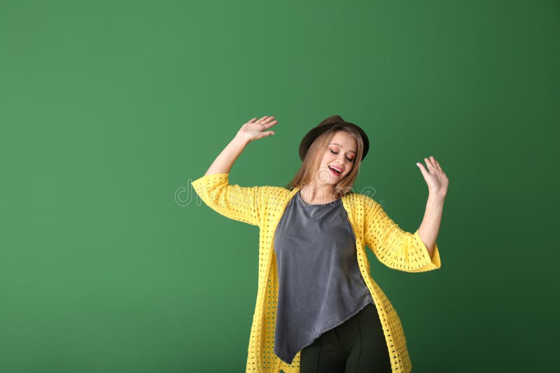 Beautiful Young Woman Dancing on Color Background Stock Image - Image ...