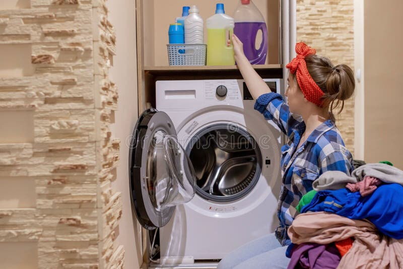 Beautiful Young Woman Doing Laundry. Housework Stock Photo - Image of ...