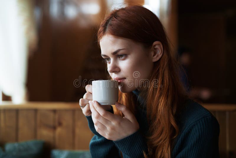 Beautiful Young Woman Drinks Coffee in a Cafe in Winter Stock Image ...