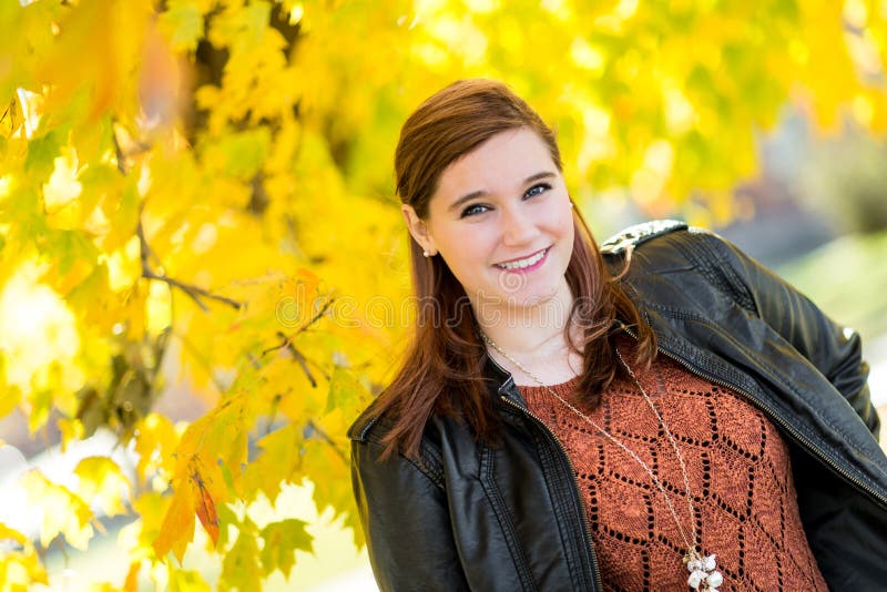 Beautiful Young Woman in the Fall Stock Image - Image of posing ...