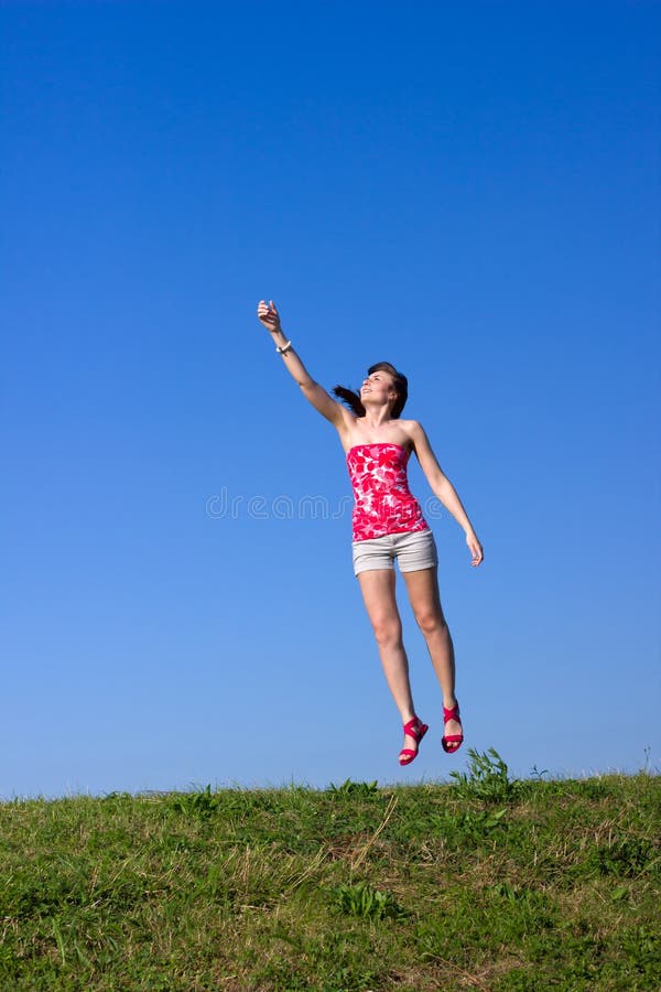 Beautiful Young Woman is Flying Up Stock Image - Image of person ...