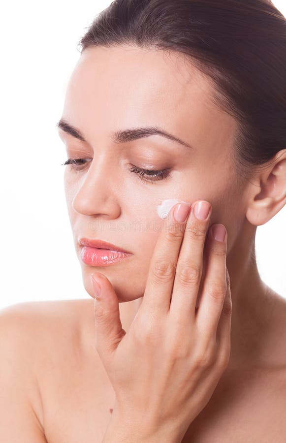 Beautiful Young Woman Girl Applying Cream On Her Face Isolated Stock