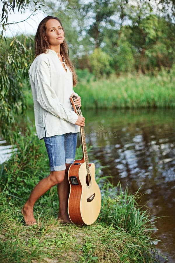 Beautiful Young Woman with Guitar Stock Photo - Image of music, face ...