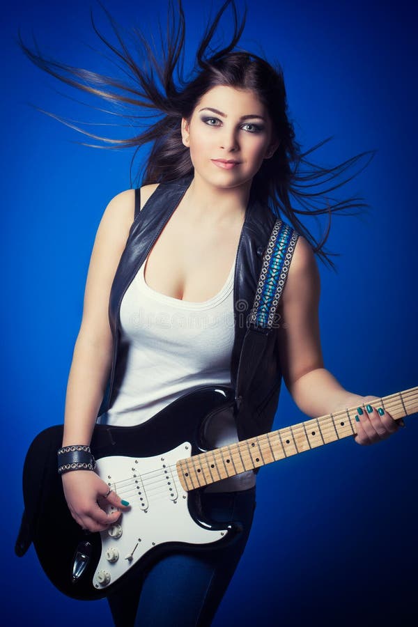 Rock girl with guitar stock photo. Image of woman, acoustic - 12680274